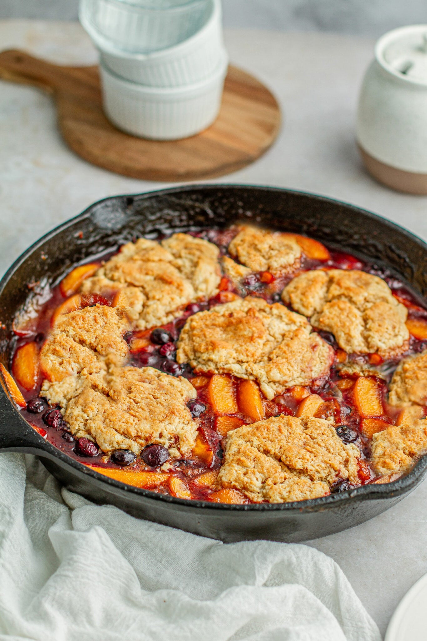 Cast Iron Blueberry Peach Cobbler with Bisquick Recipe | Meiko and The Dish